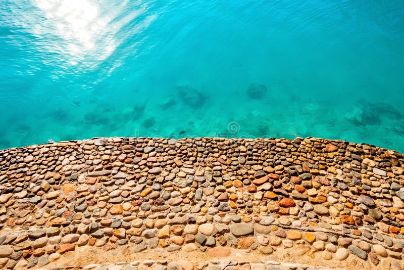 Shore is Made of Stone with Blue Clear Water Stock Image - Image of ...