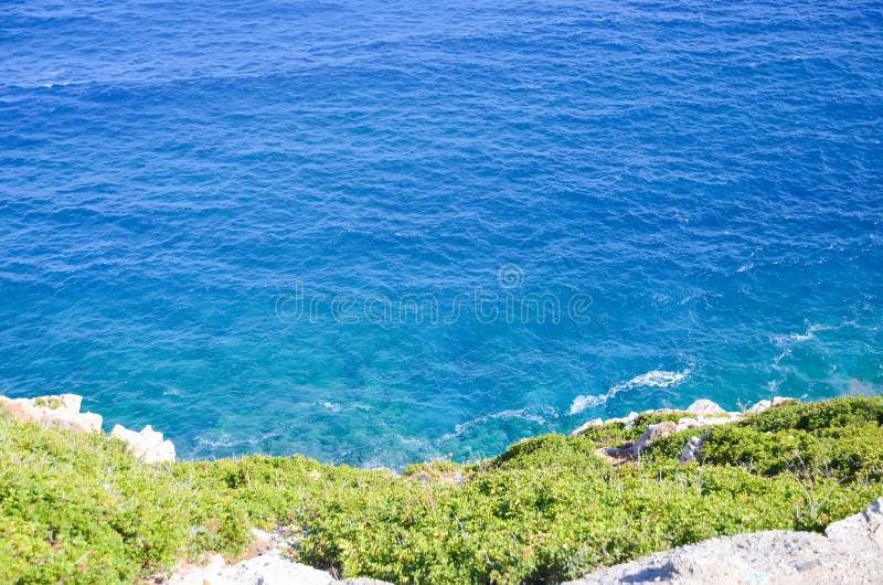 Shore meets the blue sea stock image. Image of beautiful - 69460183