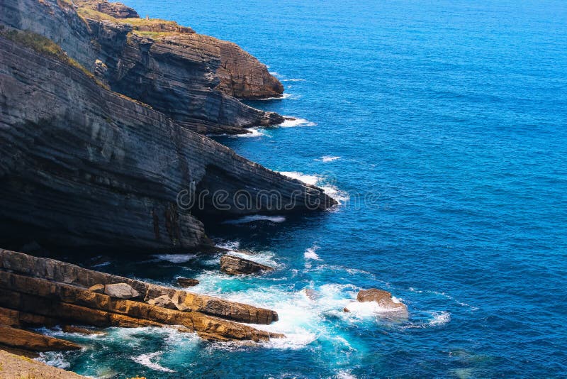 Shore with rocks stock image. Image of blue, tour, coastline - 196484217