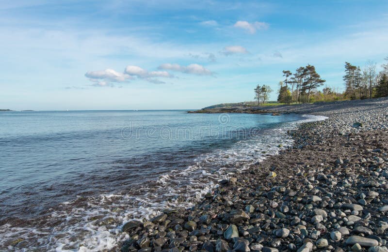 Shore Scene Full of Pebbles in the Coastline Stock Photo - Image of ...