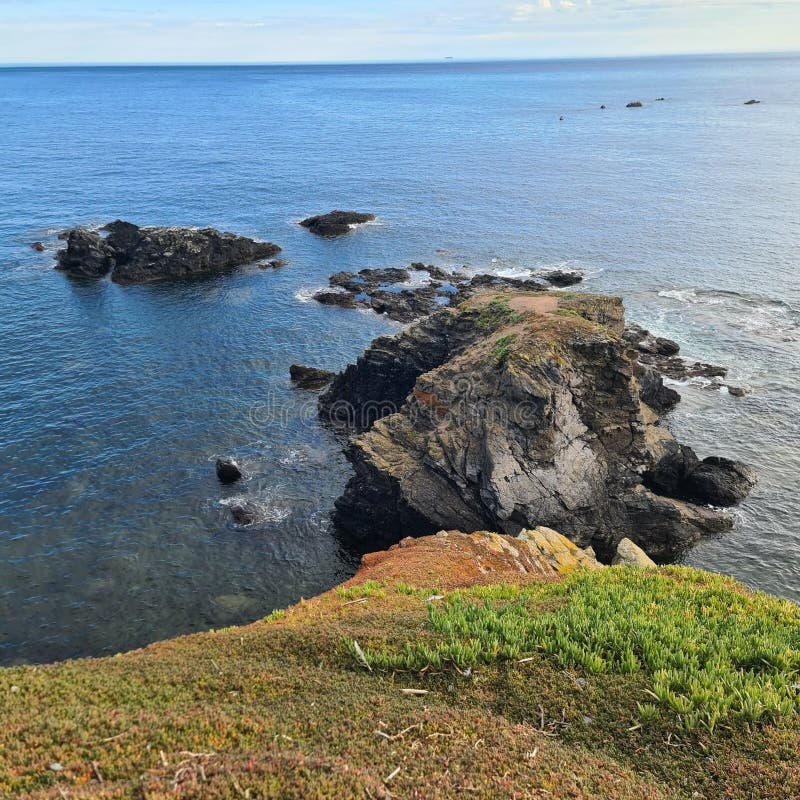 Shoreline with Huge Rocky Cliffs in Water Stock Photo - Image of huge ...