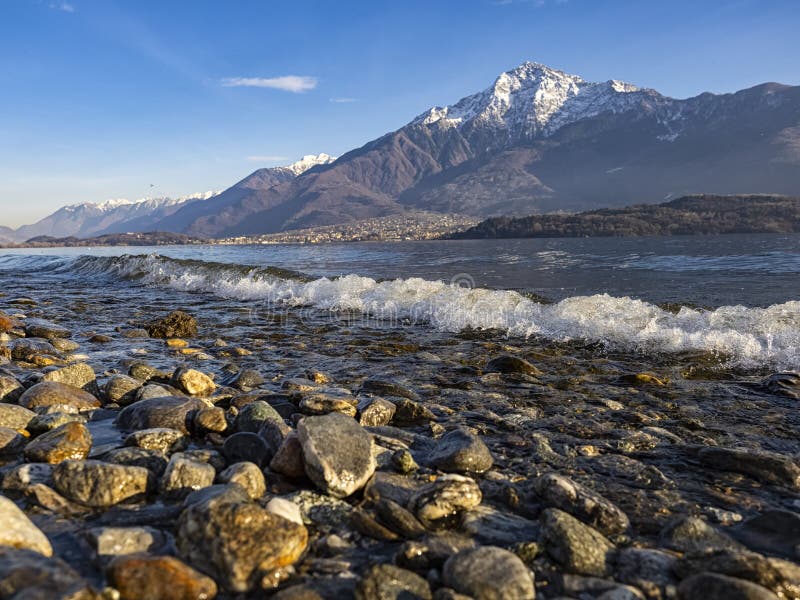 Shoreline of Lake Como at Sunset Stock Photo - Image of boat, nature ...