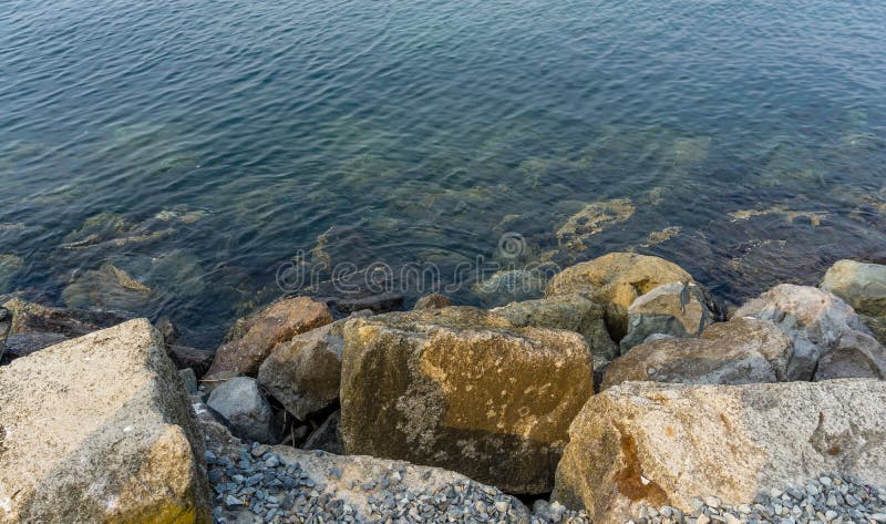 Shoreline Rocks and Sea stock image. Image of marine - 125034367