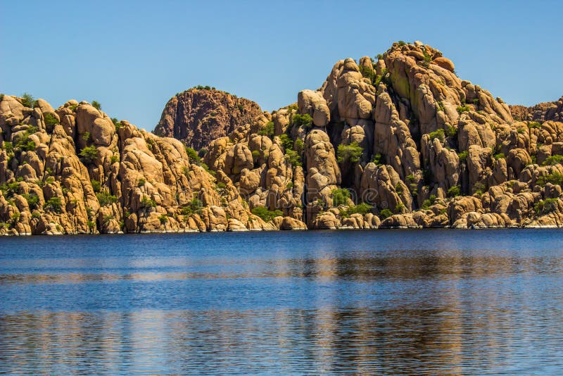 Shoreline of Rocky Boulders at Foothill Lake Stock Photo - Image of ...