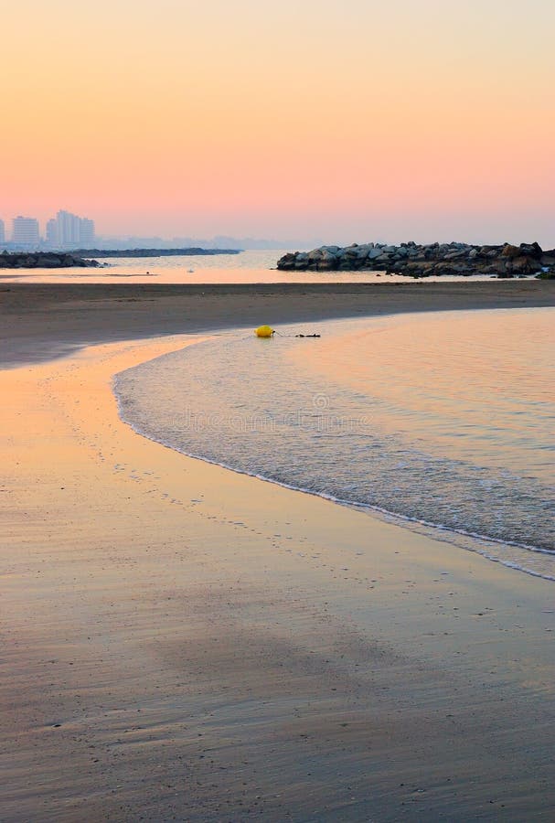 Shoreline at sunset stock image. Image of skyscraper - 36386927