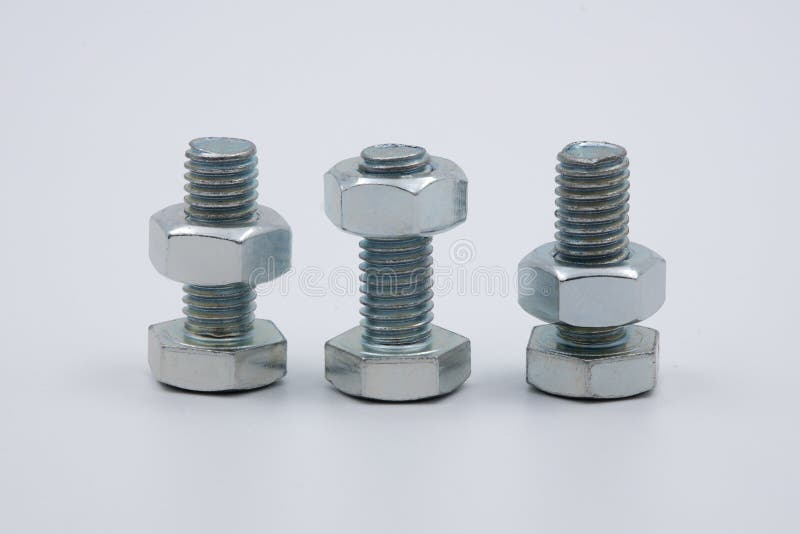 3 Short Bolts with Nuts Attached at Varying Heights Stock Photo - Image ...