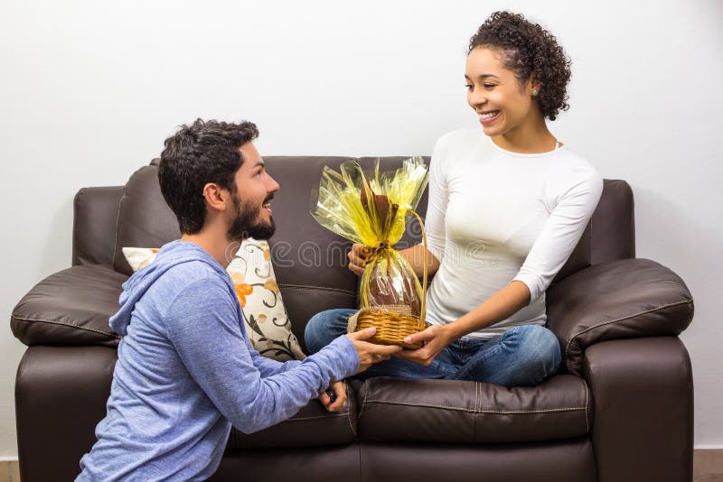 Short-haired Girlfriend is Surprised To Receive Easter Egg. Stock Image ...