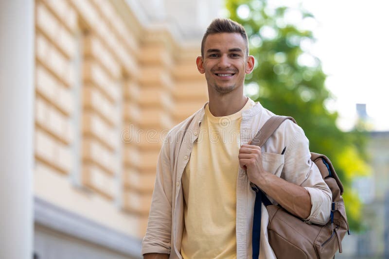 Short-haired Smiling Student with a Backpack Stock Photo - Image of ...