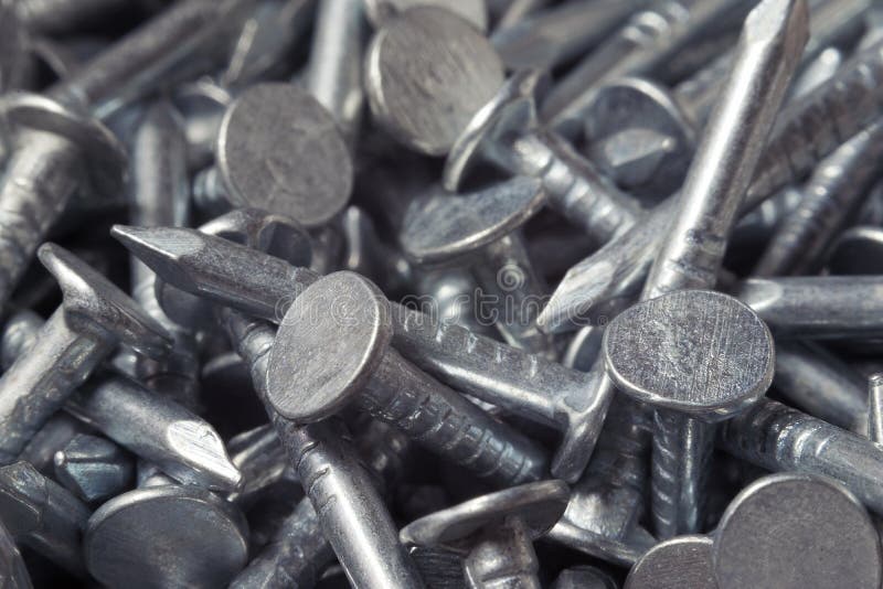 A Lot of Metal Hobnail in Group Close-up on a Light Background ...