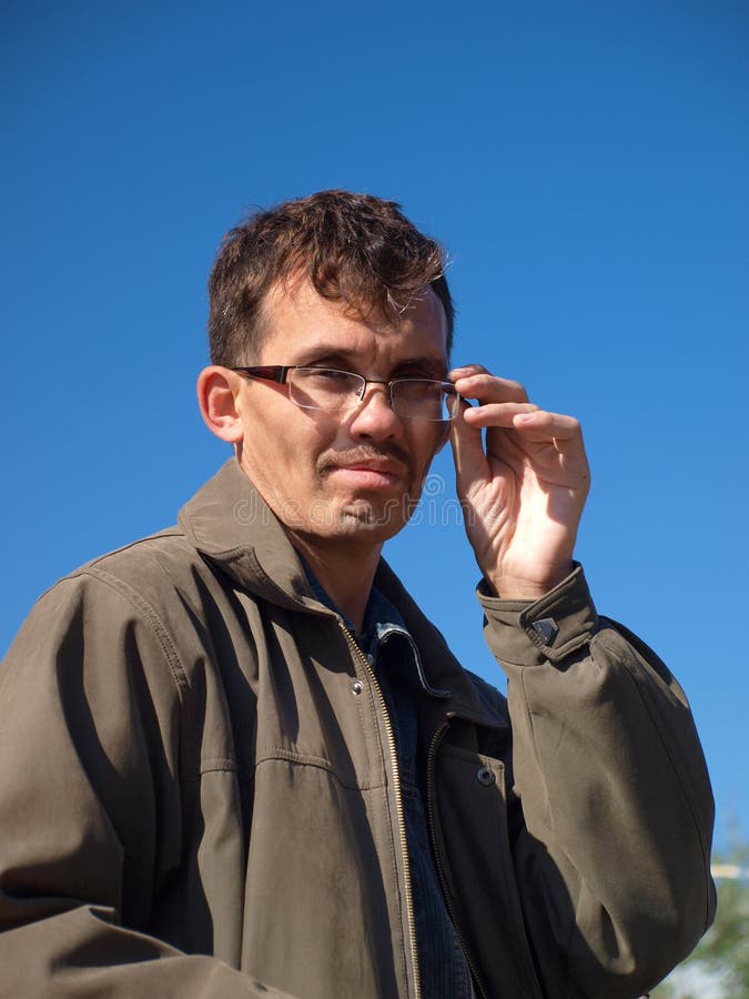 The Short-sighted Man on the Blue Stock Image - Image of adult ...