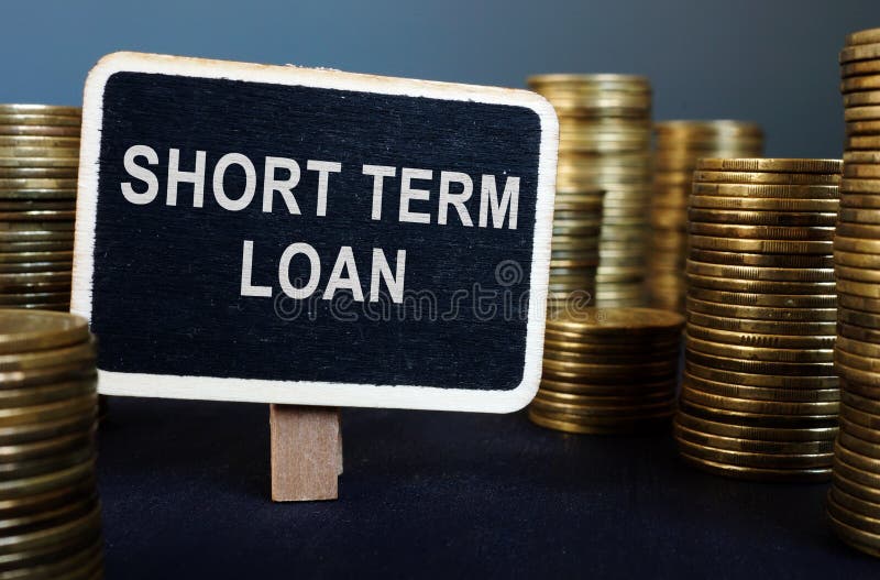 Short Term Loan Inscription and Stack of Coins Stock Photo - Image of ...