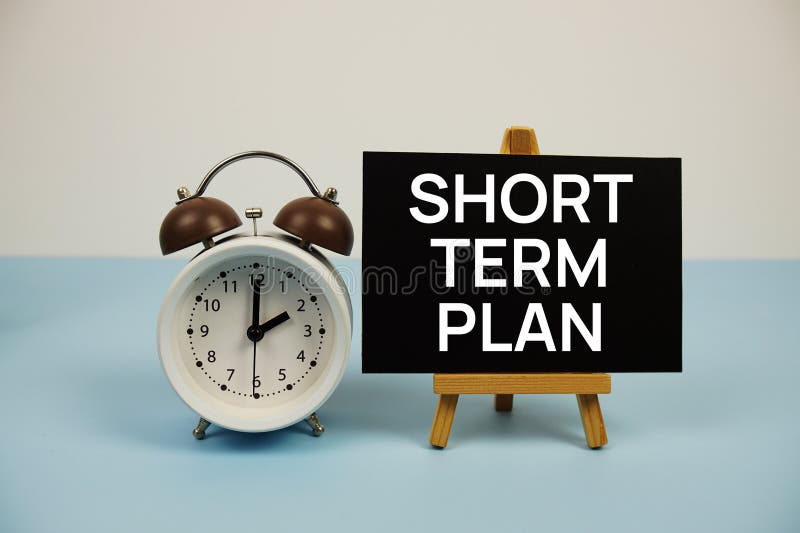 Short Term Plan Text on Paper Card with Alarm Clock on Blue Background ...