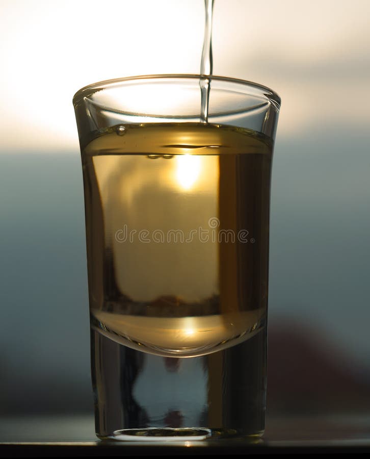 A Shot of an Alcohol Beverage Being Drunk Stock Photo - Image of cold ...