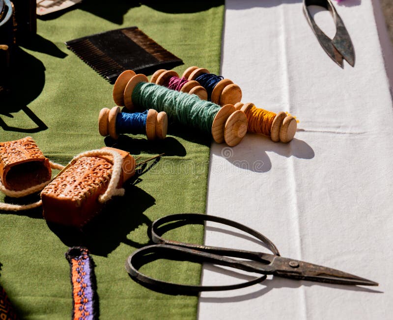 Shot of Ancient Medieval Sewing Textile Tools on a Work Table with ...