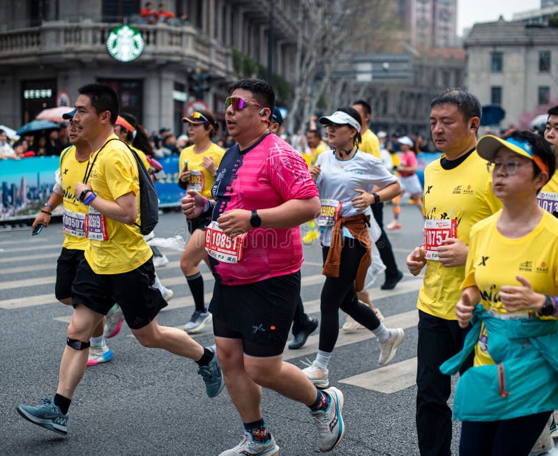 Shot of Athletes Running at the Wuhan Marathon. Editorial Photography ...