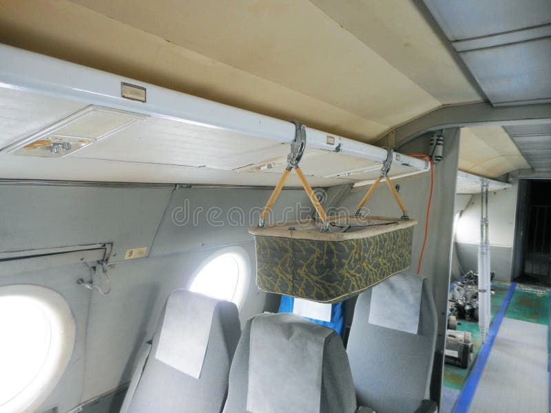 Shot of a Baby Cradle Inside of the Airplane. Aviation Editorial ...