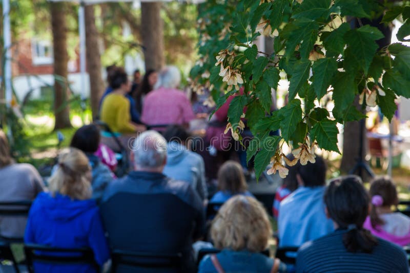 Group of Singers Form a Circle on the Stage while Singing Native ...