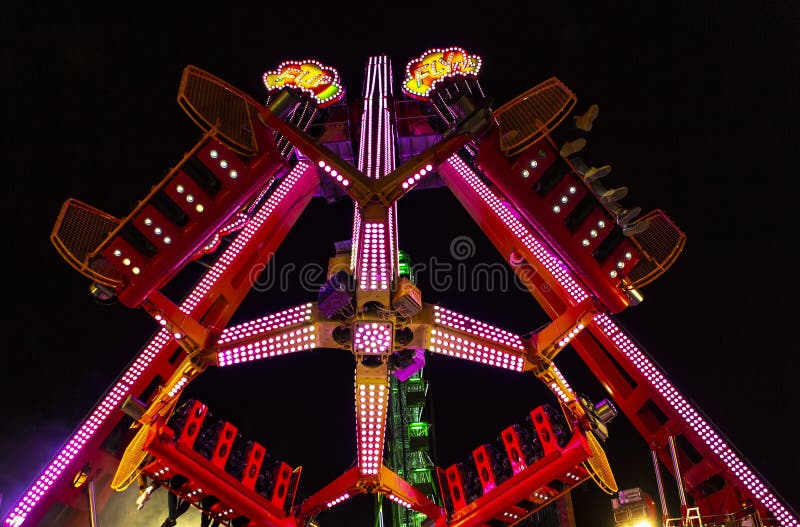 Shot from Below of Illuminated Fairground Ride Stock Image - Image of ...