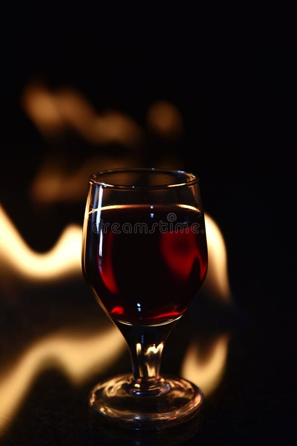 Shot of Cognac Drink with Fire in the Background Glass of Red Wine ...