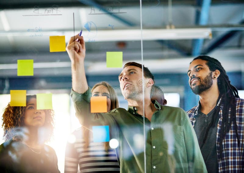 New Ideas for a New Business. Shot of Colleagues Having a Brainstorming ...