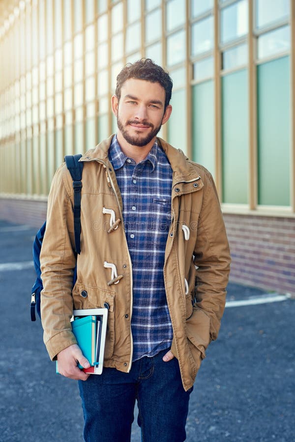 Its Great Being on Campus. Shot of a College Student between Classes on ...