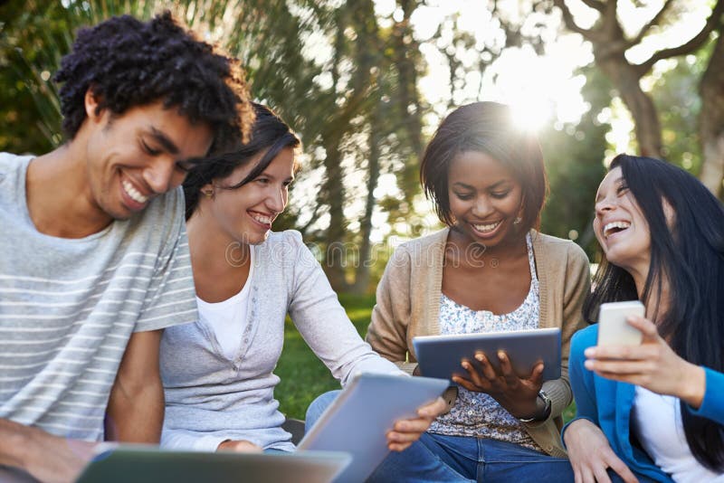College Diversity. Shot of a Diverse Group of College Students Sitting ...
