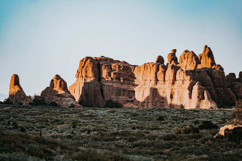 Shot of Dry Desert Stones with Some Grass on a Sunny Day Stock Image ...