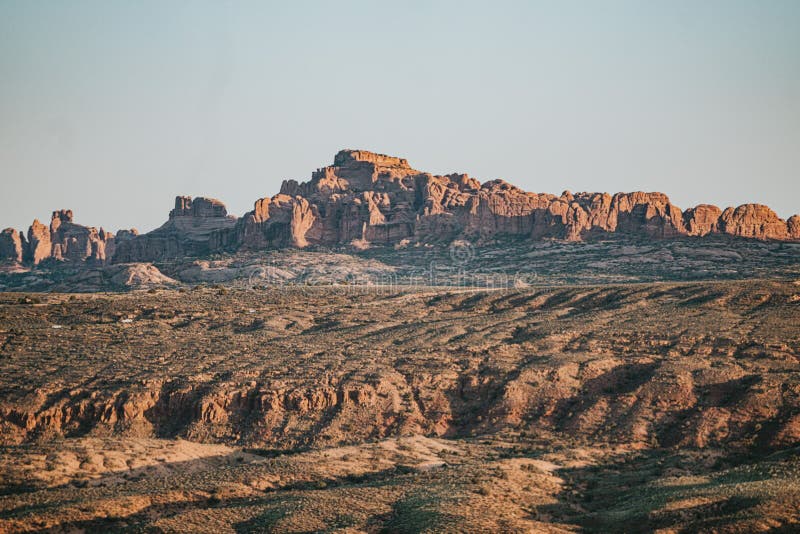 Shot of Dry Desert Stones with Some Grass on a Sunny Day Stock Image ...