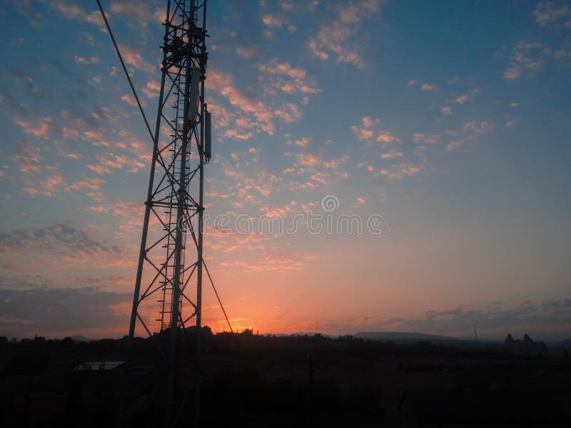Shot of Electric Tower Captured during the Sunset Stock Photo - Image ...
