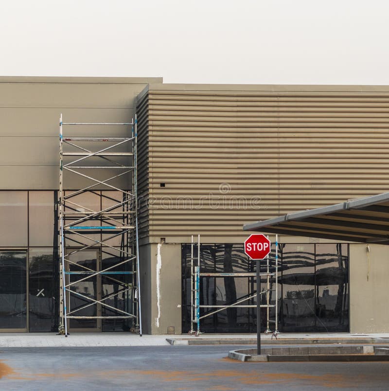 Shot of a Empty Parking and Building Under Final Stages of Construction ...