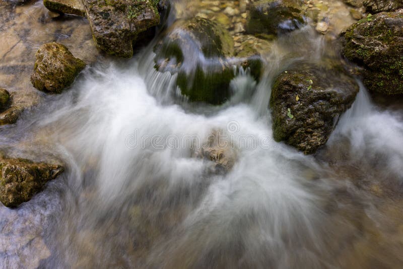 Shot of Flowing Water Over River Rocks on the Bank Stock Image - Image ...