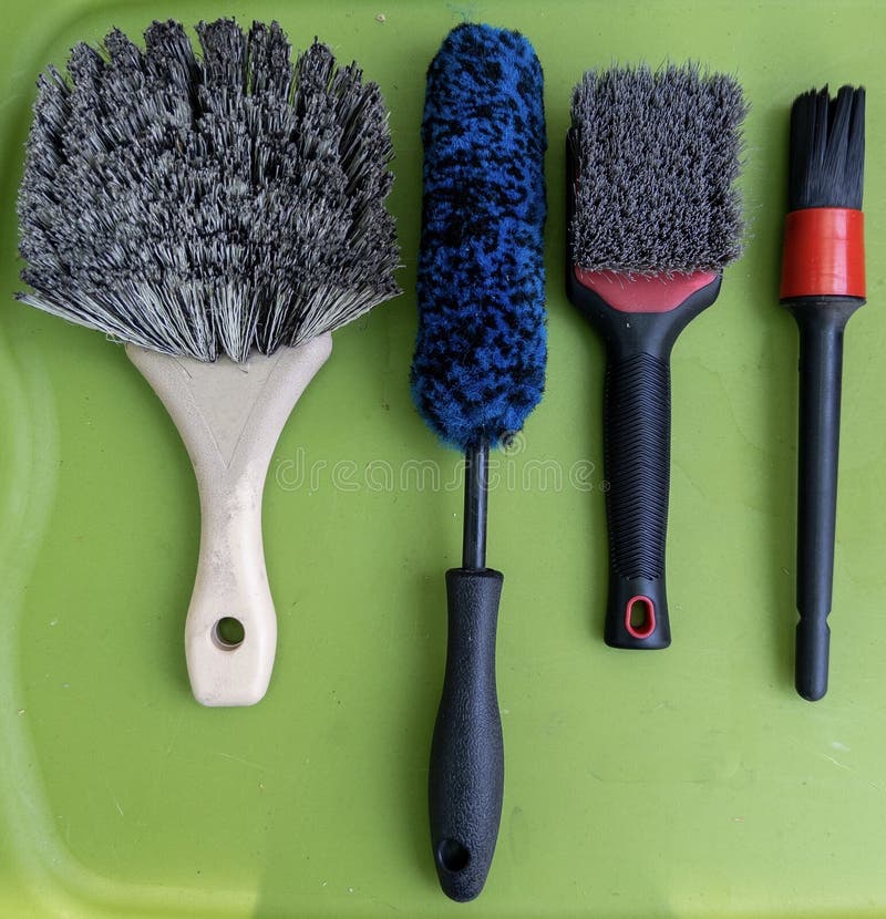 Shot of Four Brushes on a Green Tray Stock Photo - Image of tool ...