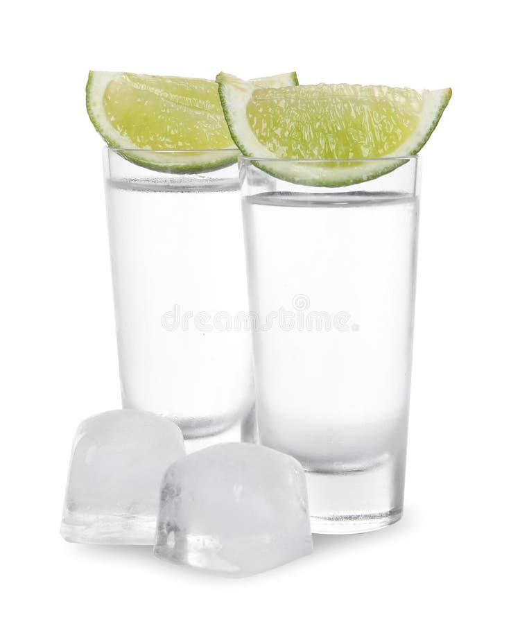 Shot Glasses of Vodka with Lime Slices and Ice on White Background ...