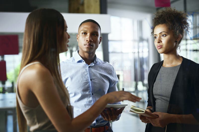Discussions that Get Things Done. Shot of a Group of Young ...