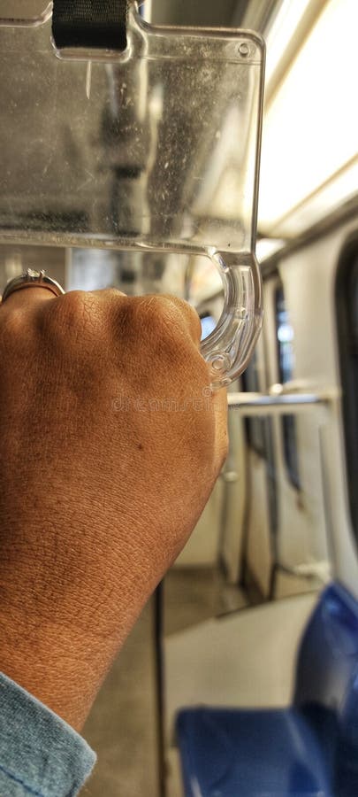 Shot Hand Holding the Holder in the Train Stock Photo - Image of drink ...