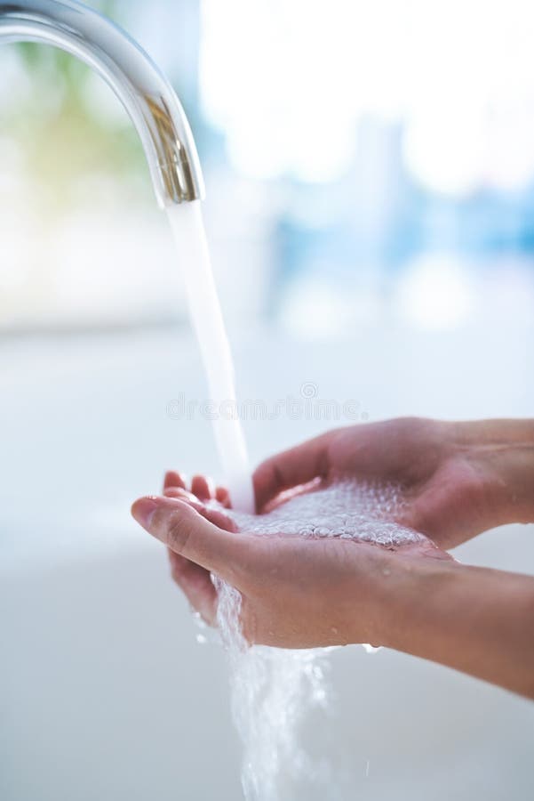 Wash Away those Germs. Shot of Hands Being Washed at a Tap. Stock Photo ...