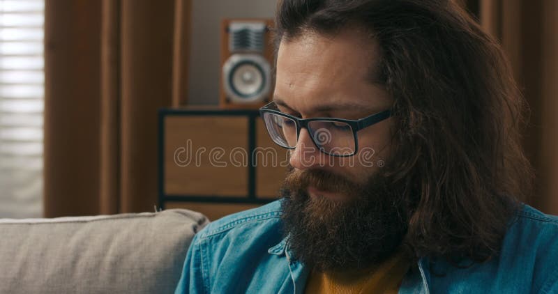 A Shot of Hands Tapping Keyboard Buttons on a Laptop Held in the Lap by ...