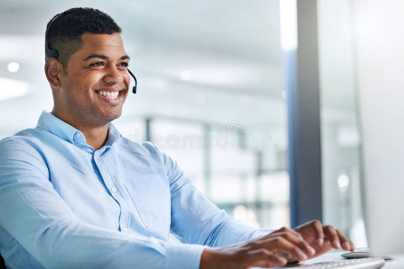 Being Friendly Goes a Long Way. Shot of a Handsome Young Call Centre ...