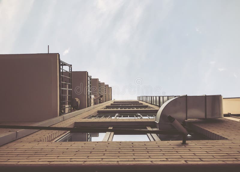 A Shot of a High-rise Building from the Bottom Up Against the Sky Stock ...