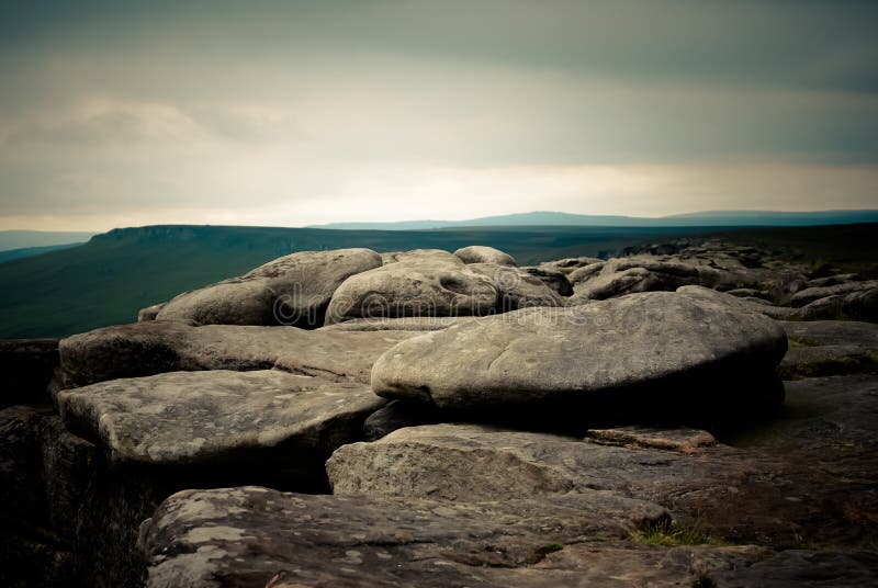 Shot of Huge Rocks with a Beautiful Horizon Including Mountain and ...