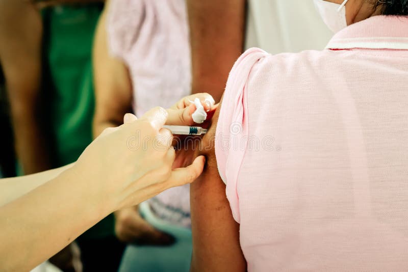 Shot of Human Hands Making an Injection with a Syringe Stock Image ...