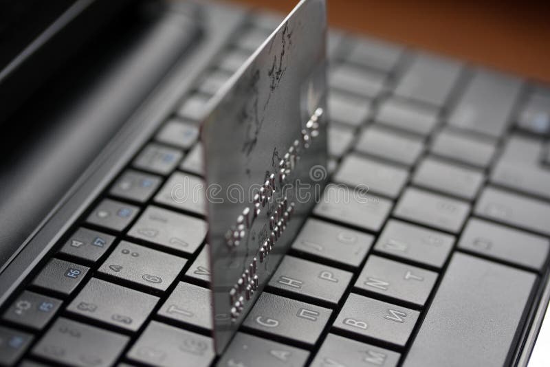 A Shot of a Laptop and a Credit Card Stock Image - Image of retail ...