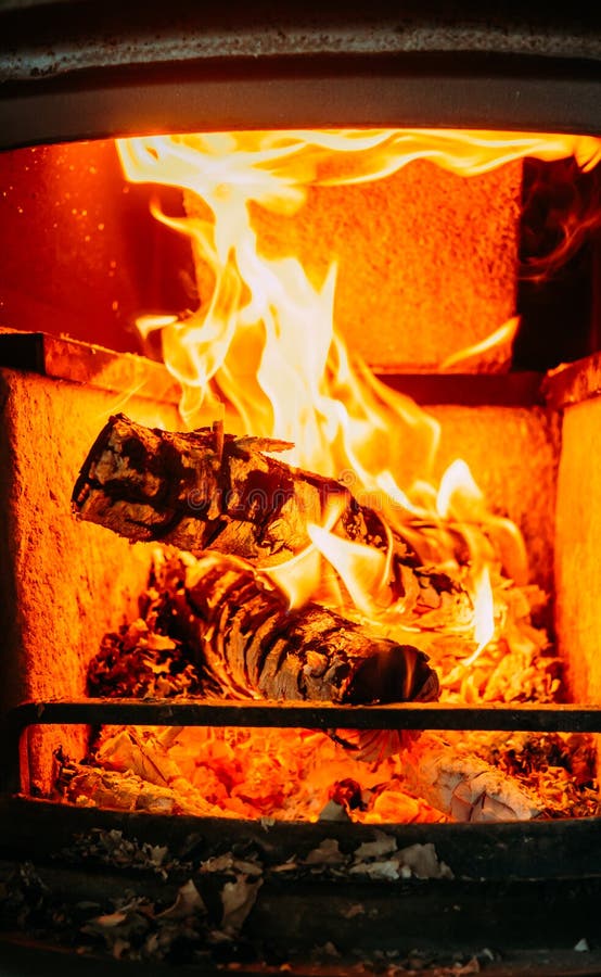 Logs of Wood Burning in the Fireplace in the House. Stock Image - Image ...