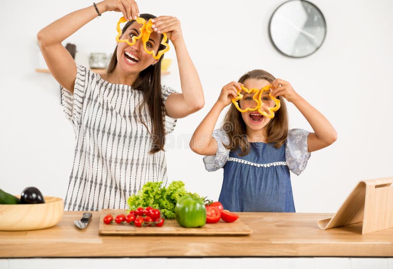 Having fun in the kitchen stock image. Image of home - 242640297