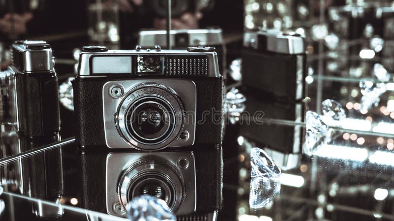 Shot of Old Photography Camera in the Mirror Stock Photo - Image of ...