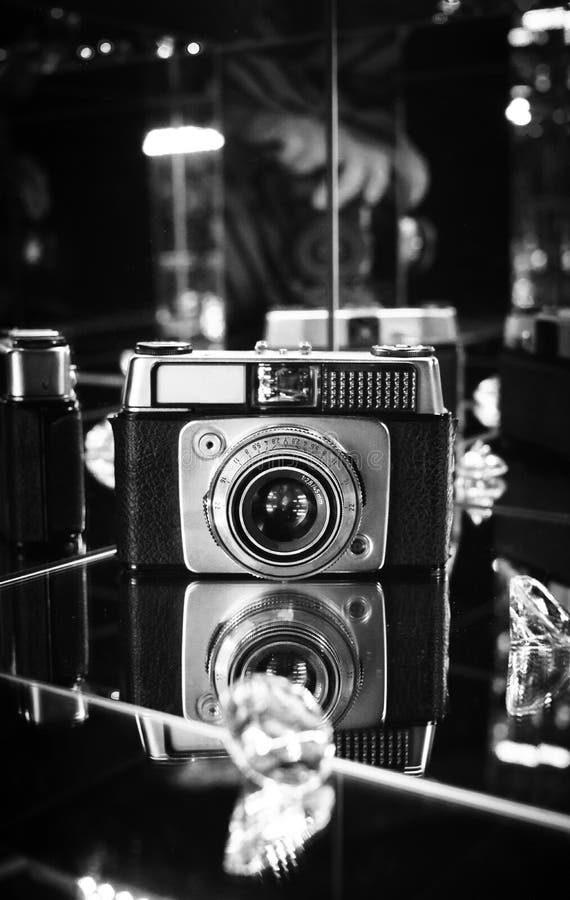 Shot of Old Photography Camera in the Mirror Stock Photo - Image of ...