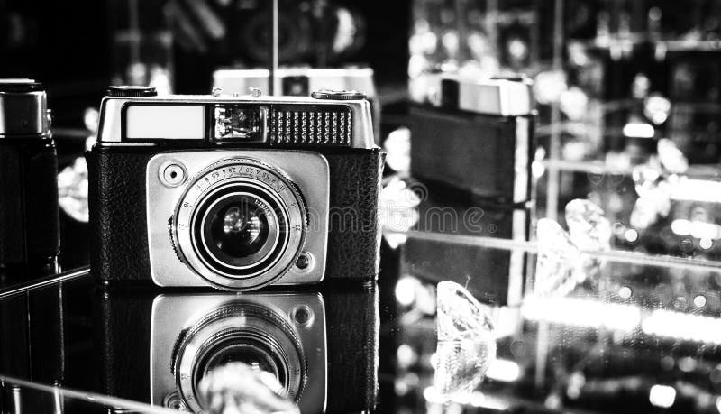 Shot of Old Photography Camera in the Mirror Stock Photo - Image of ...