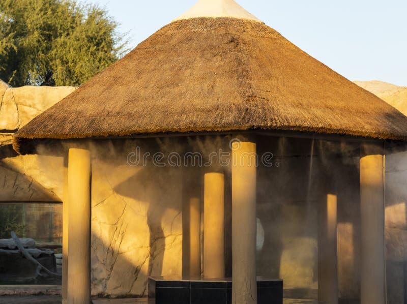 Shot of an Outdoor Arbor Cooled by Mist. Concept Stock Photo - Image of ...