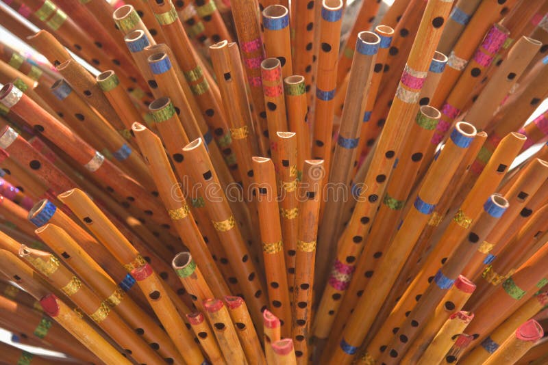 Shot of painted reed pipes stock image. Image of color - 217645947