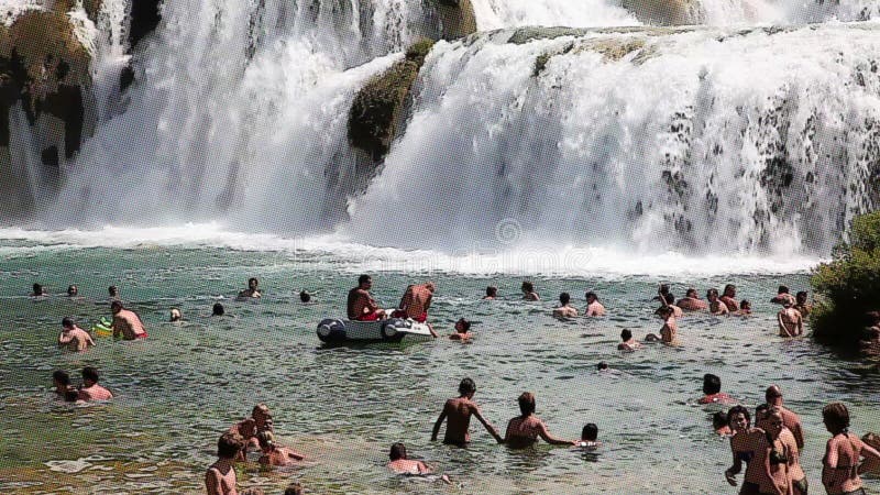 Shot of the People Swimming Under the Waterfall in Krka National Park ...